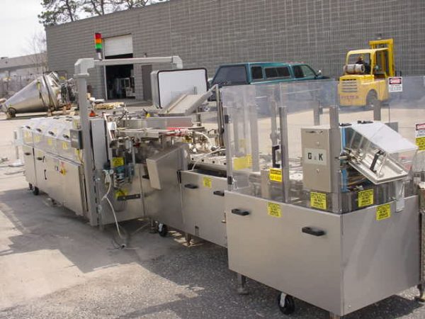 MGS HCM-750 HORIZONTAL CONTINUOUS MOTION CARTONER WITH NORDSON GLUING ...