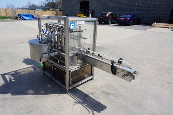 Biner Ellison Six Head Straight Line Piston Filling Machine - Wohl ...
